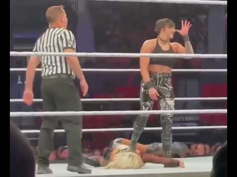 Rhea Ripley crashes Liv Morgan under her foot and steps on Natalya @MattKempke 