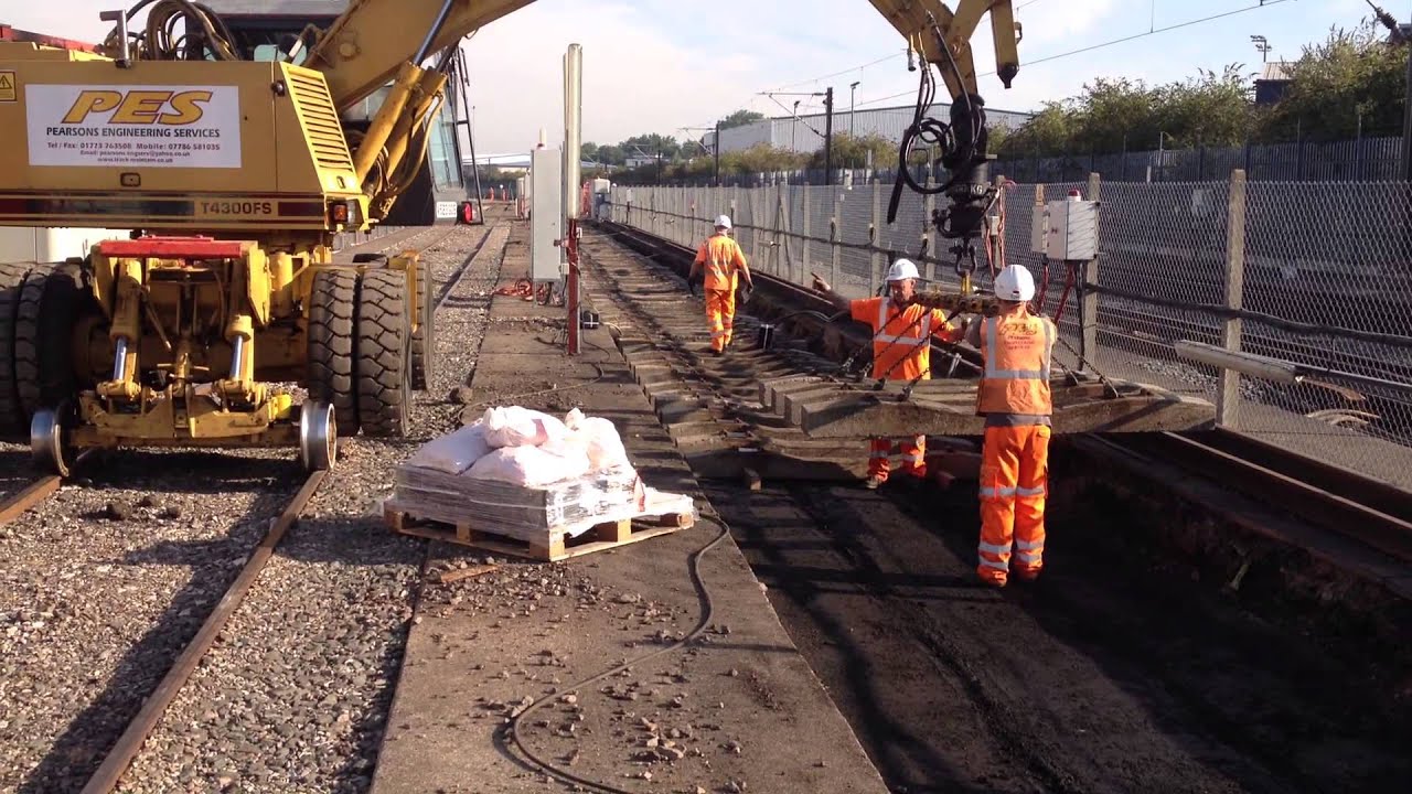 Railway maintenance - Concrete sleeper installation - YouTube