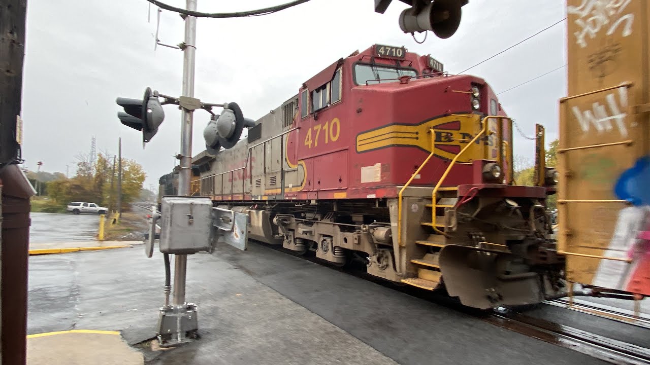 BNSF Warbonnet #4710 trails on CSXT M372-30 in Brunswick, Md on 10:31: ...