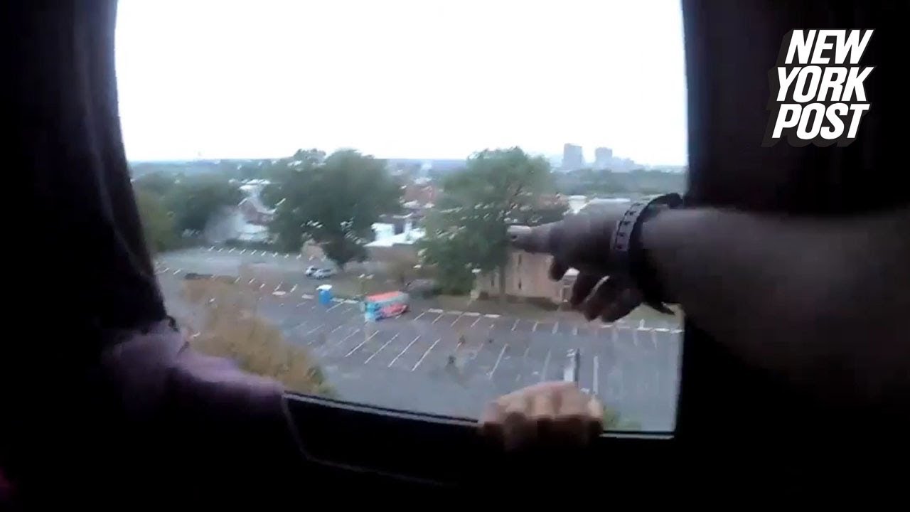Hero cop saves grieving man from jumping out window | New York Post ...