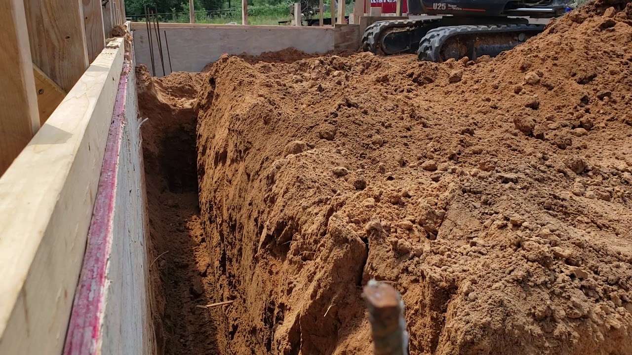 Kubota U-25 - Digging Beams for Concrete Foundation👷🚧 - YouTube
