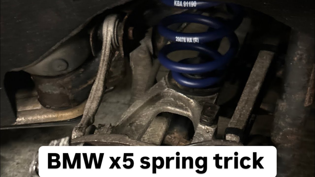 BMW x5 rear spring replacement trick ( easy ) - YouTube