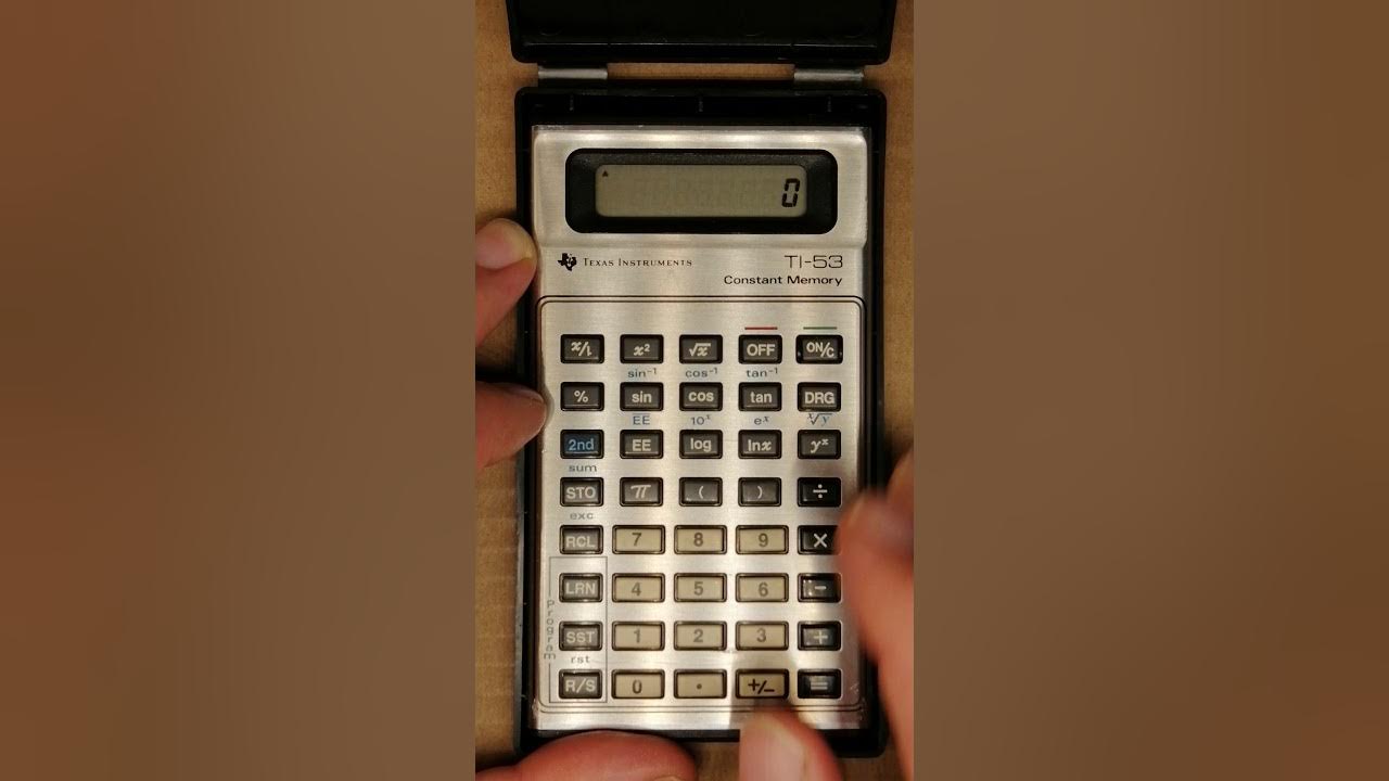Texas Instruments vintage TI-53 calculates square root of 100 with ...
