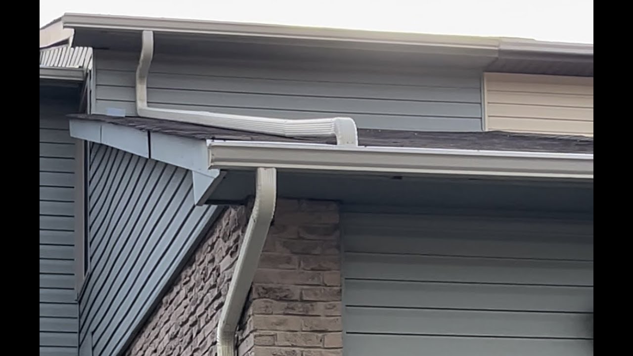 Changing gutters & downspouts.. mixing potting mix to the soil n ...