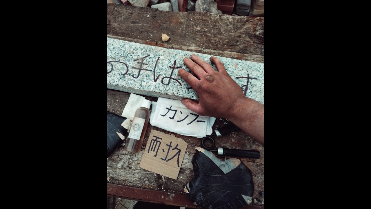 Breaking bricks with hand - YouTube