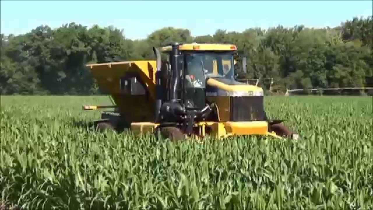 Seeding cover crop in standing corn with RoGator high-boy - YouTube
