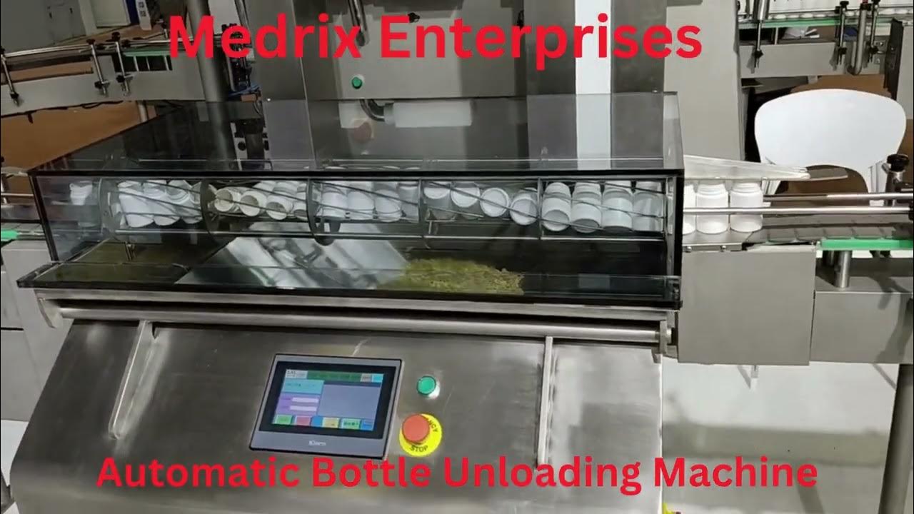 AUTOMATIC BOTTLE UNLOADING MACHINE - YouTube