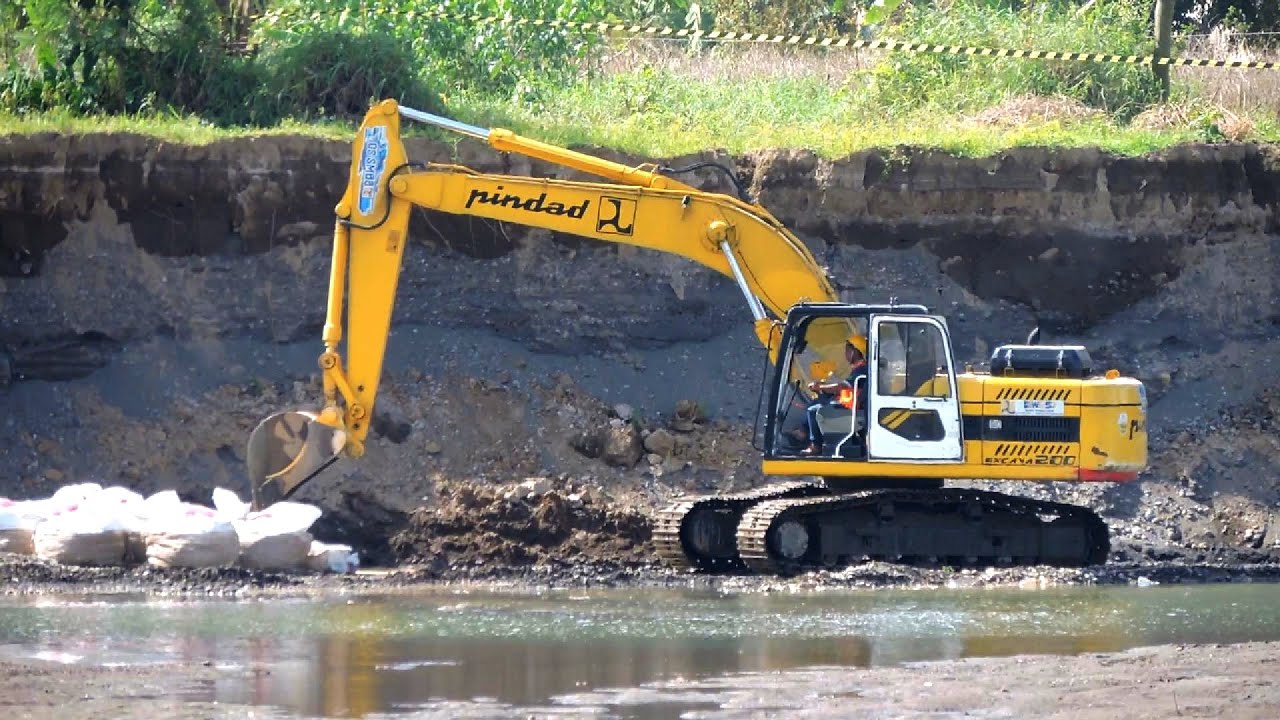 Pindad Excava 200 Excavator is working to move a pile of Sand - YouTube