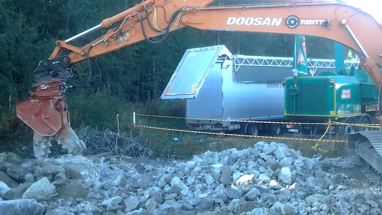 Doosan dx 255 lc ja hydrauliset pihdit - YouTube
