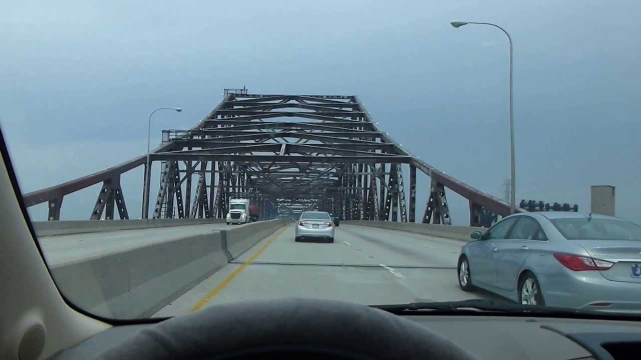 Family in car driving to Chicago going over bridge into Illinois 06/25 ...