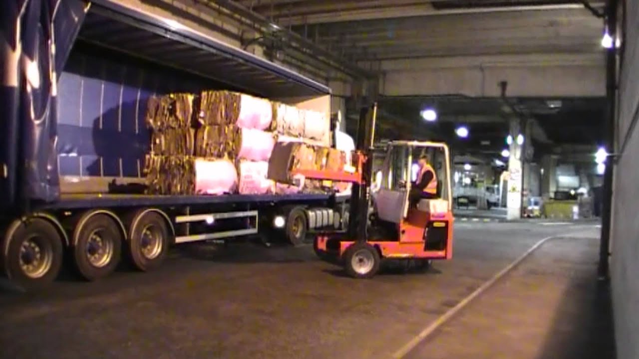 Palfinger truck mounted forklift - Baled Cardboard collection - YouTube