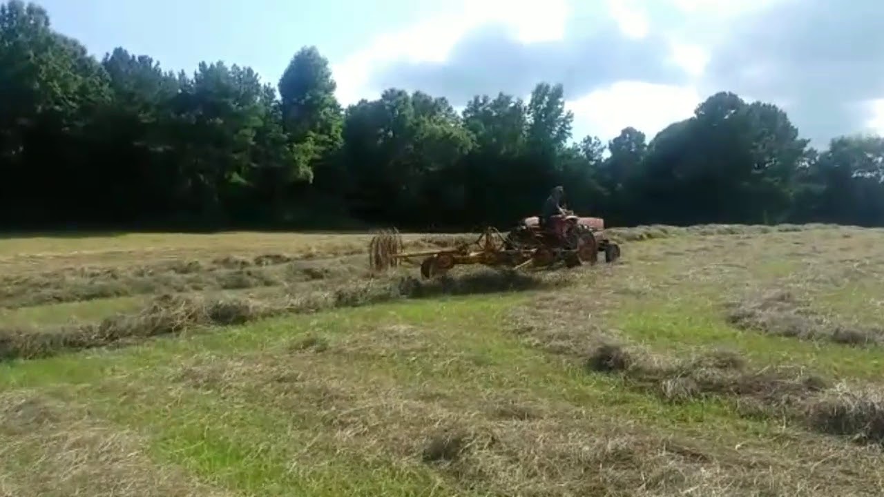 Raking hay - YouTube
