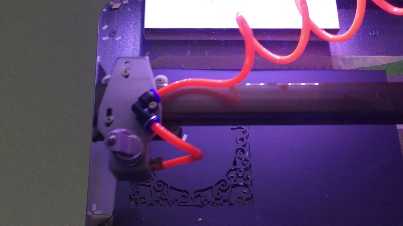 Laser cutting a card face - YouTube