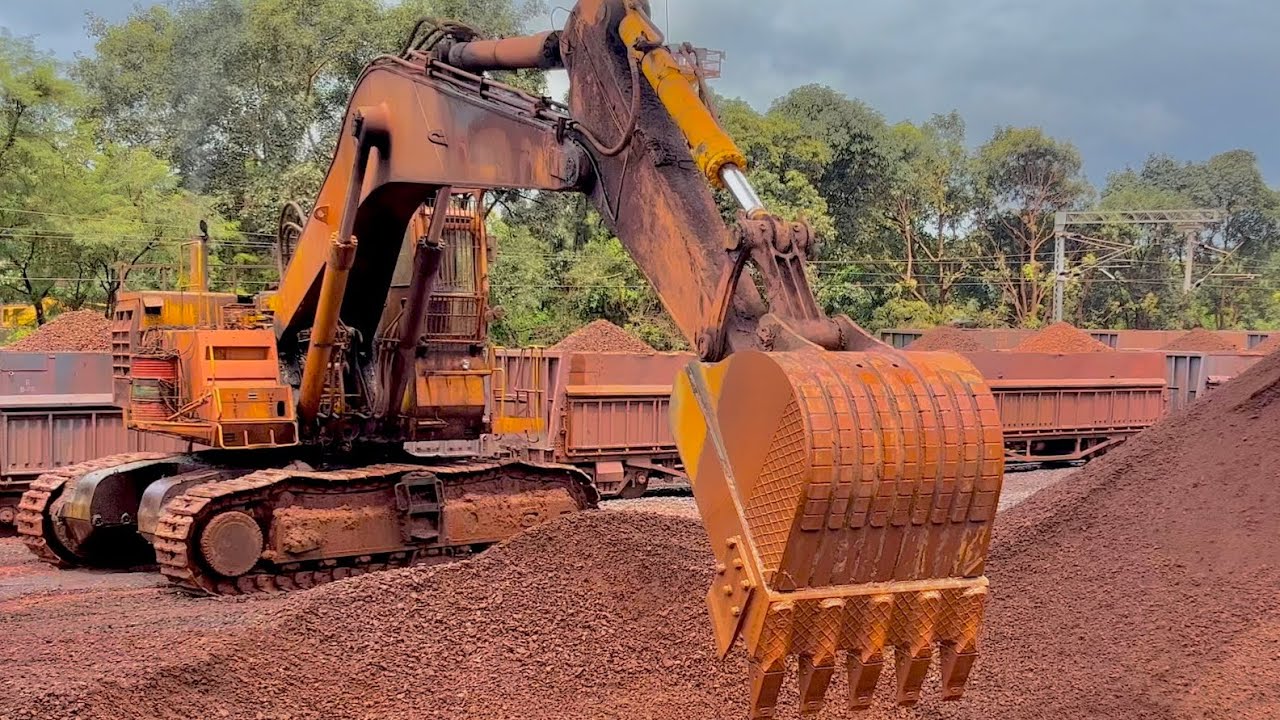 Beml Excavator BE1000 Loading High Grade Iron Ore In Railway wagons ...