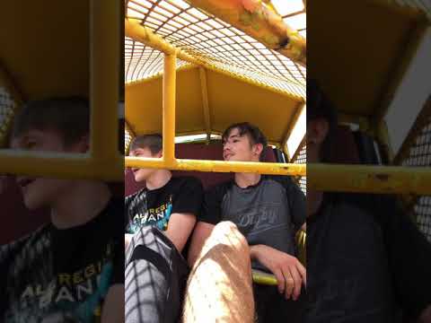 Guy throws up in carnival ride but somehow completely misses his friend