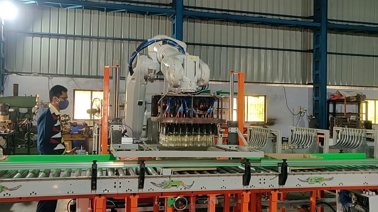 Robotic Case Packer- Glass Bottles - YouTube