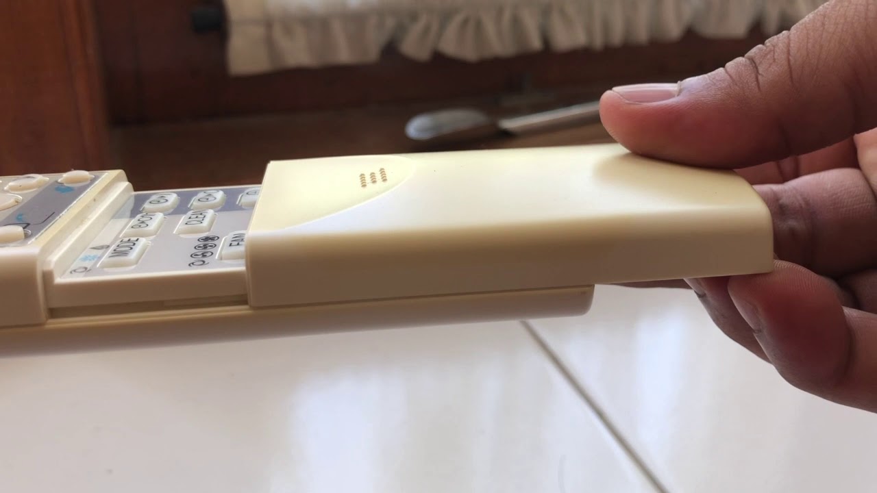cara mengganti baterai remote AC sharp - YouTube