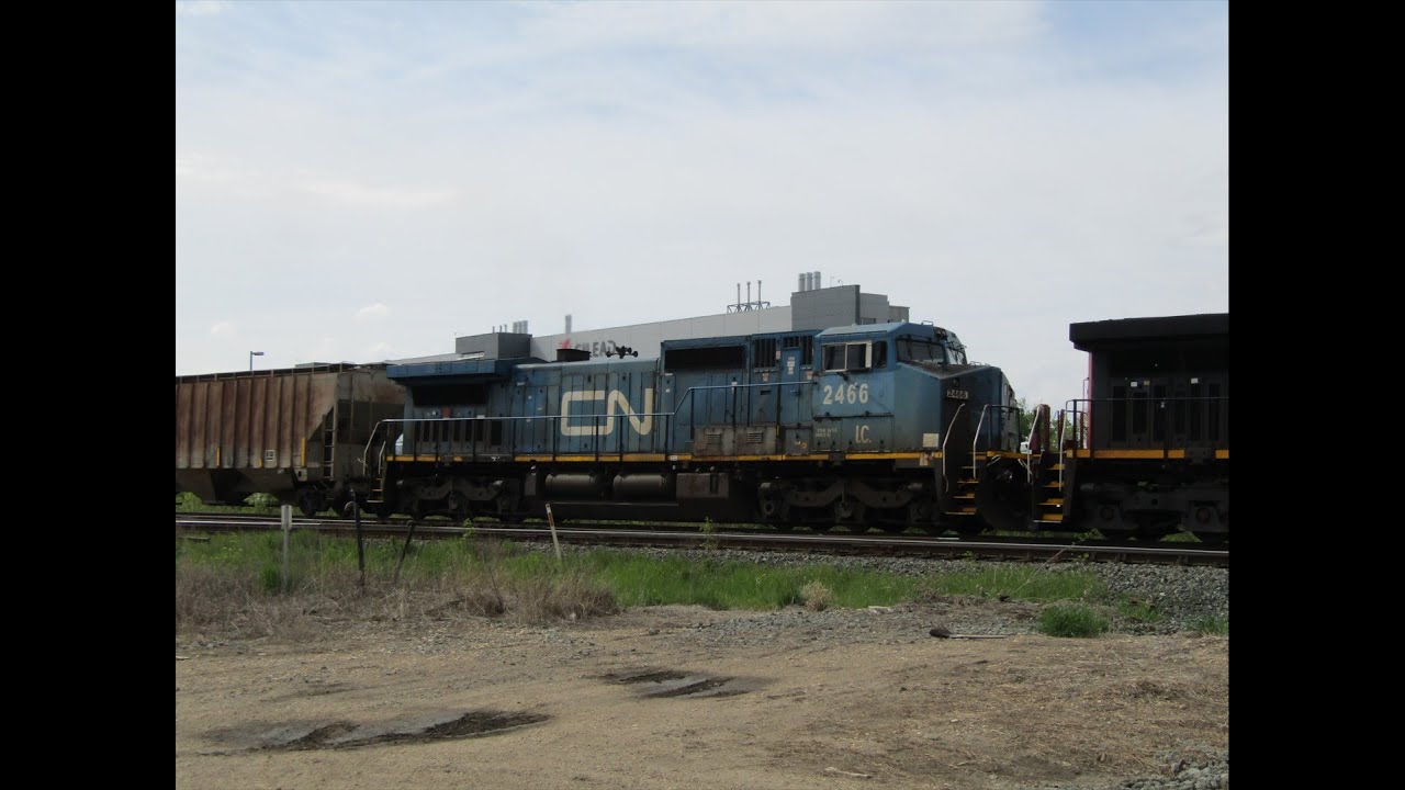 CN Blue Devil 2466 (C40-8W) Trails Behind CN 2632 on Train A402 Past Edmonton, AB - YouTube