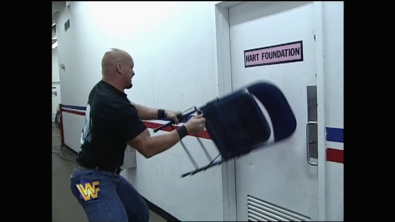 Stone Cold Steve Austin goes Nuts and tries to kick down Hart ...