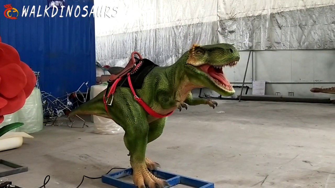 The animatronic Green T-rex Ride is popular with adults and children ...