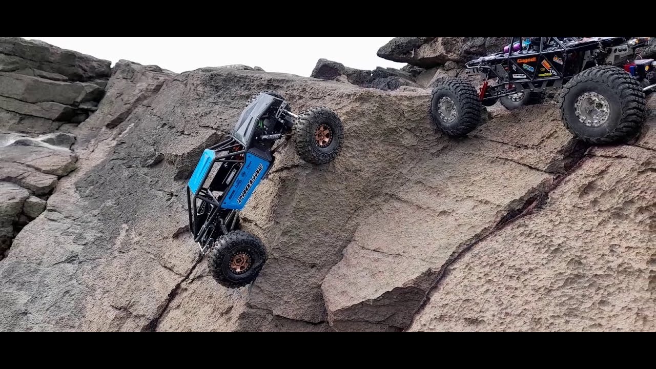 1/10 scale 4x4 Rc Capra and 4x4 Rc Axial trucks doing an amazing climb ...