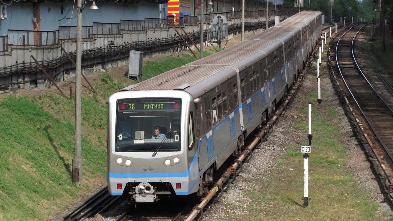 Moscow metro: "Rusich" trains in the forest. Ground section of the ...