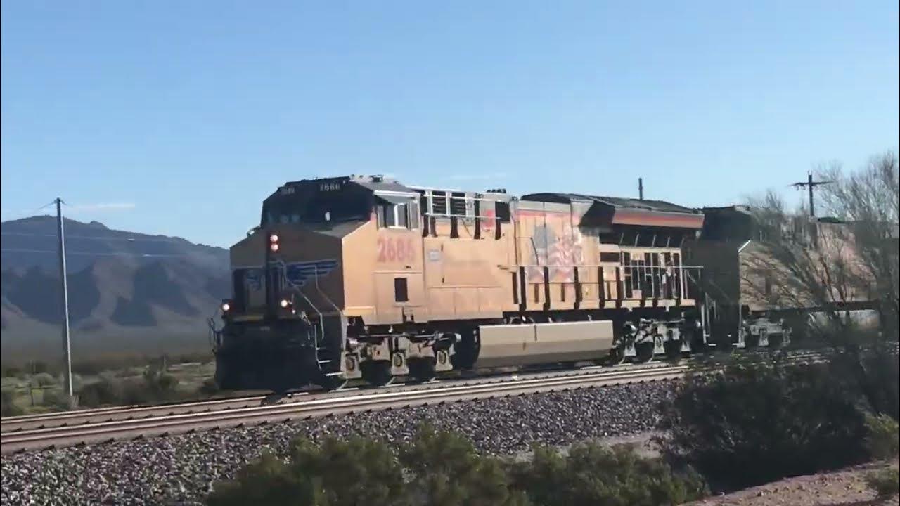 UP 2686 leads the West bound. a fast moving container freight - YouTube