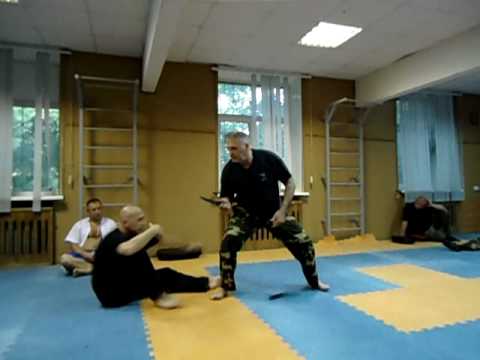 Knife armed defense against a knifefighter (spontaneous) - YouTube