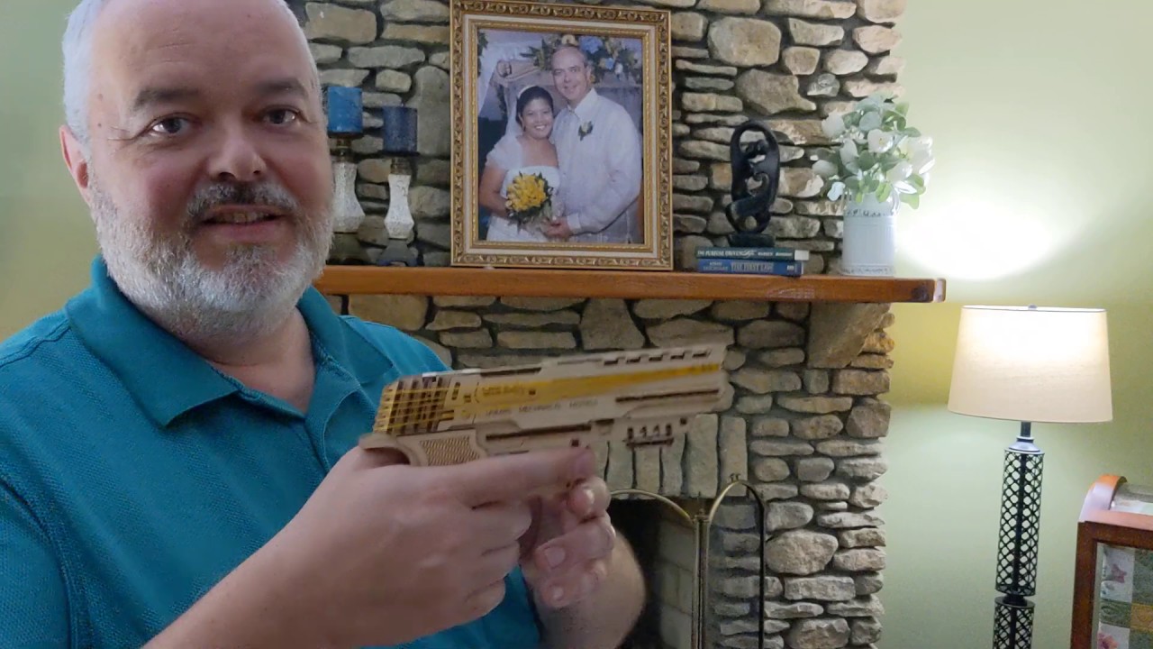 Firing my new UGEARS WOLF-01 five-shot semi-auto wooden rubber band gun ...