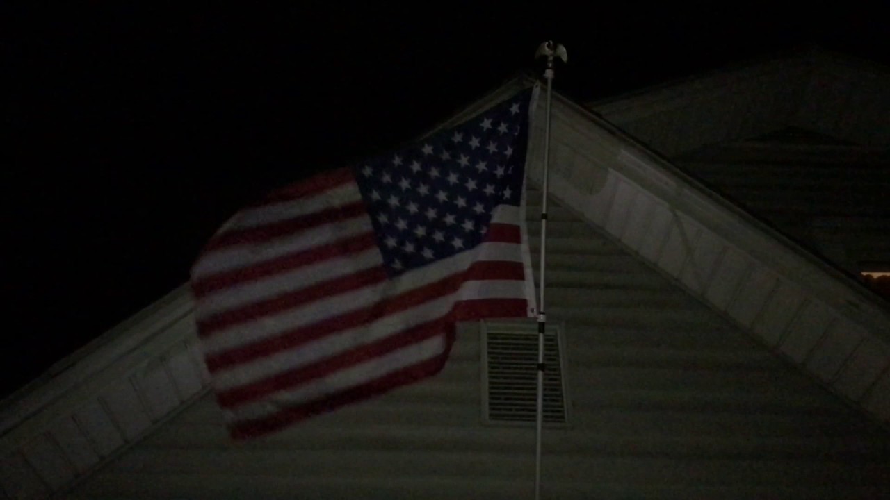 Outrigger flag pole with illuminated American flag. - YouTube