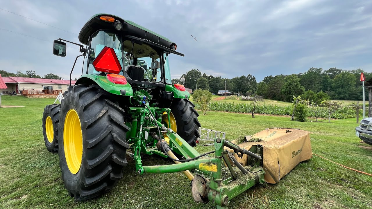 Brand New John Deere 5M Cutting Hay. - YouTube