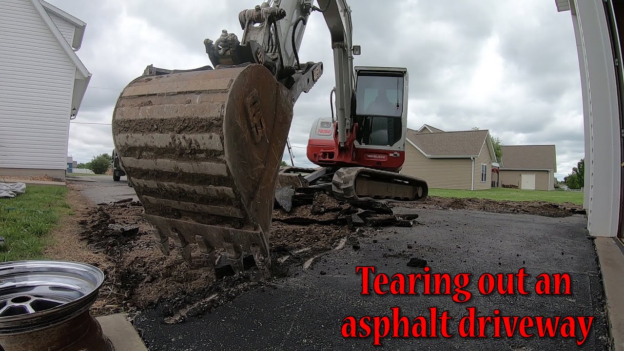Tearing Out An Asphalt Driveway - YouTube