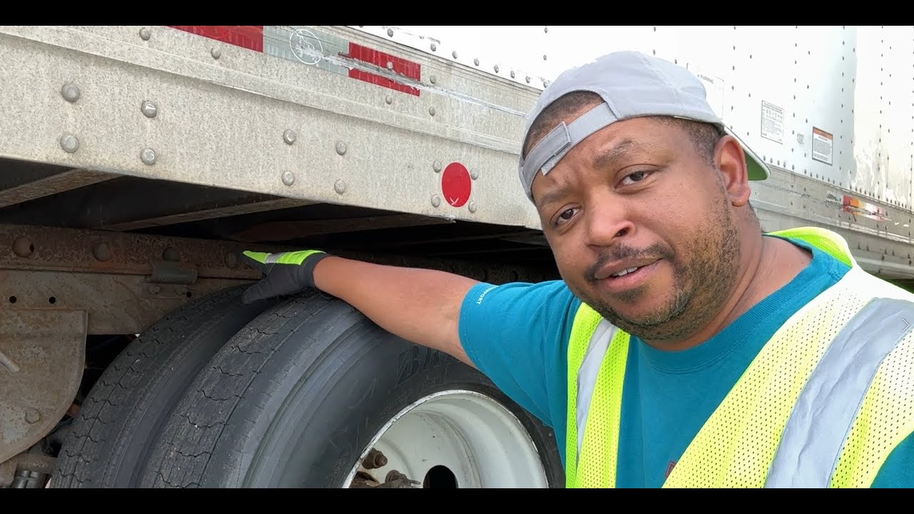 How to slide trailer tandems. - YouTube