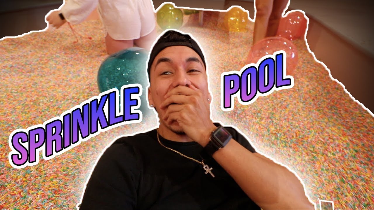 JUMPING INTO A POOL FULL OF SPRINKLES! - YouTube
