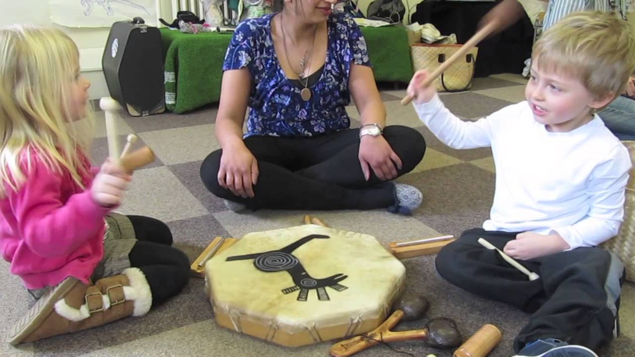 2 Children playing the Shaman Drum from the Nursery Rhythm Kit with ...