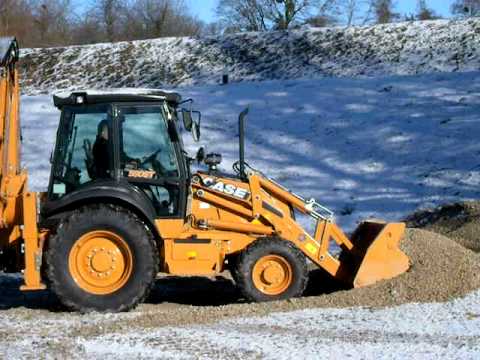 Brand new backhoe loader Case 580 ST loading Case 330B dumper - YouTube