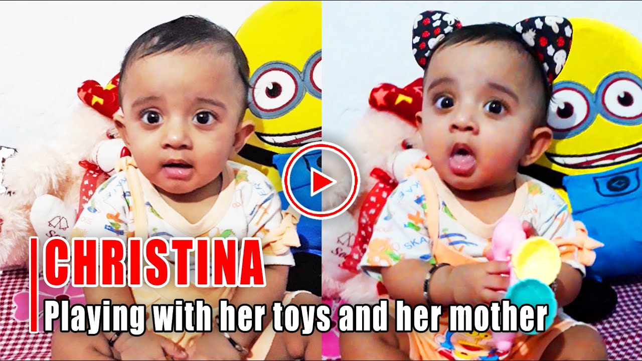 Christina baby playing with her toys and her mother. Kid playing with ...