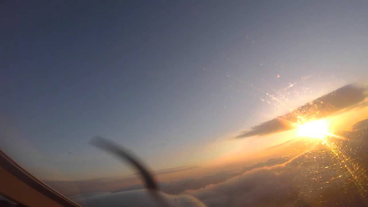 Flying above the clouds in sunset - Piper Archer - YouTube