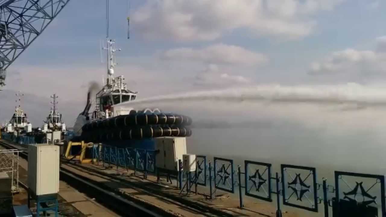 Fire Fighting Monitors of a Tug Boat in action - YouTube