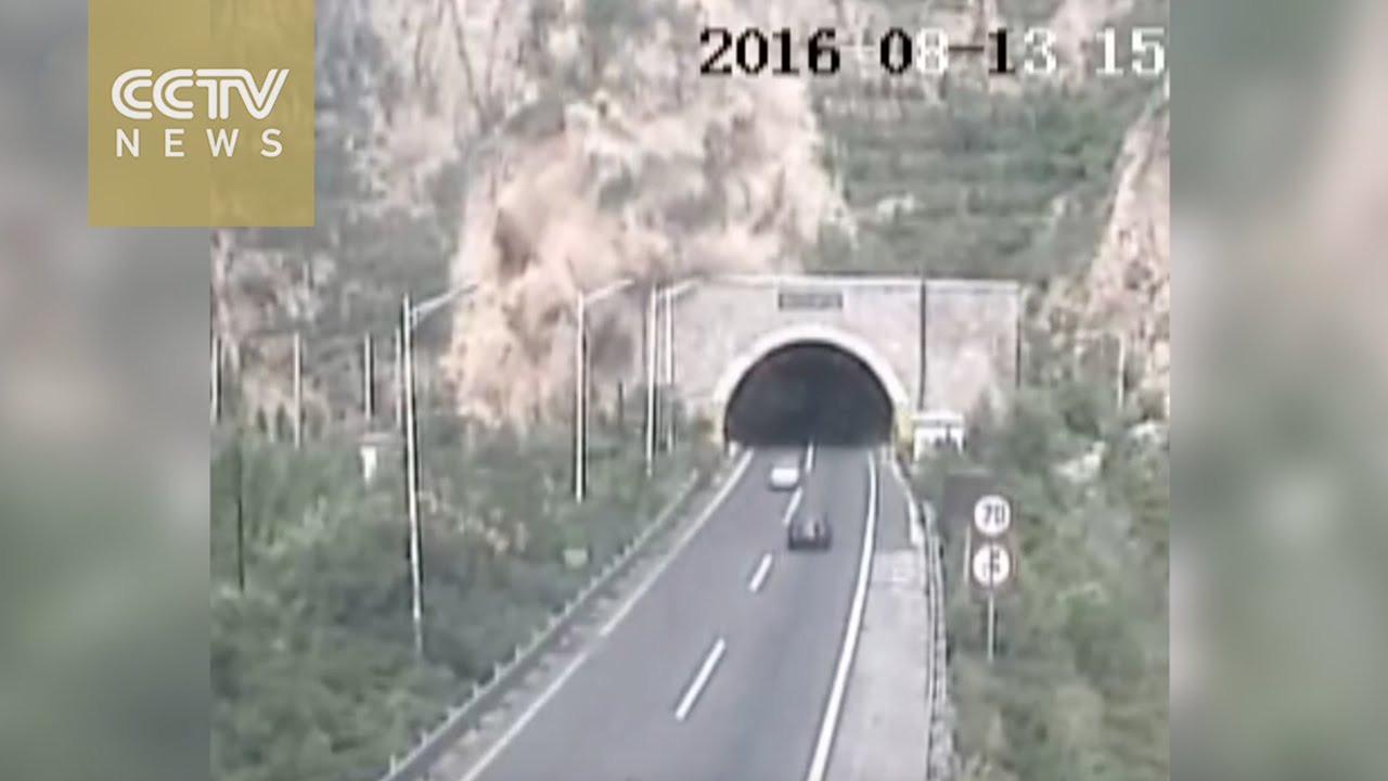 Footage: Cliff collapses and blocks highway tunnel - YouTube