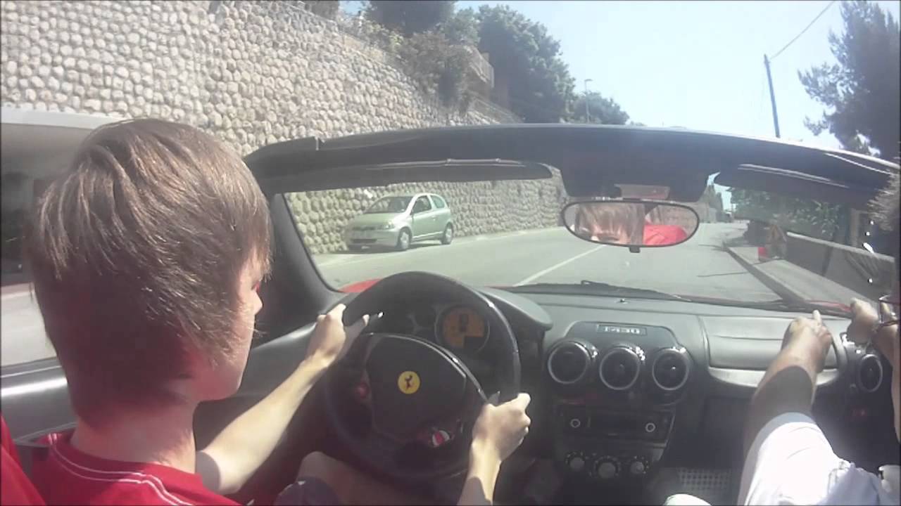 Teen driving Ferrari F430 spider above the hills of monaco. - YouTube