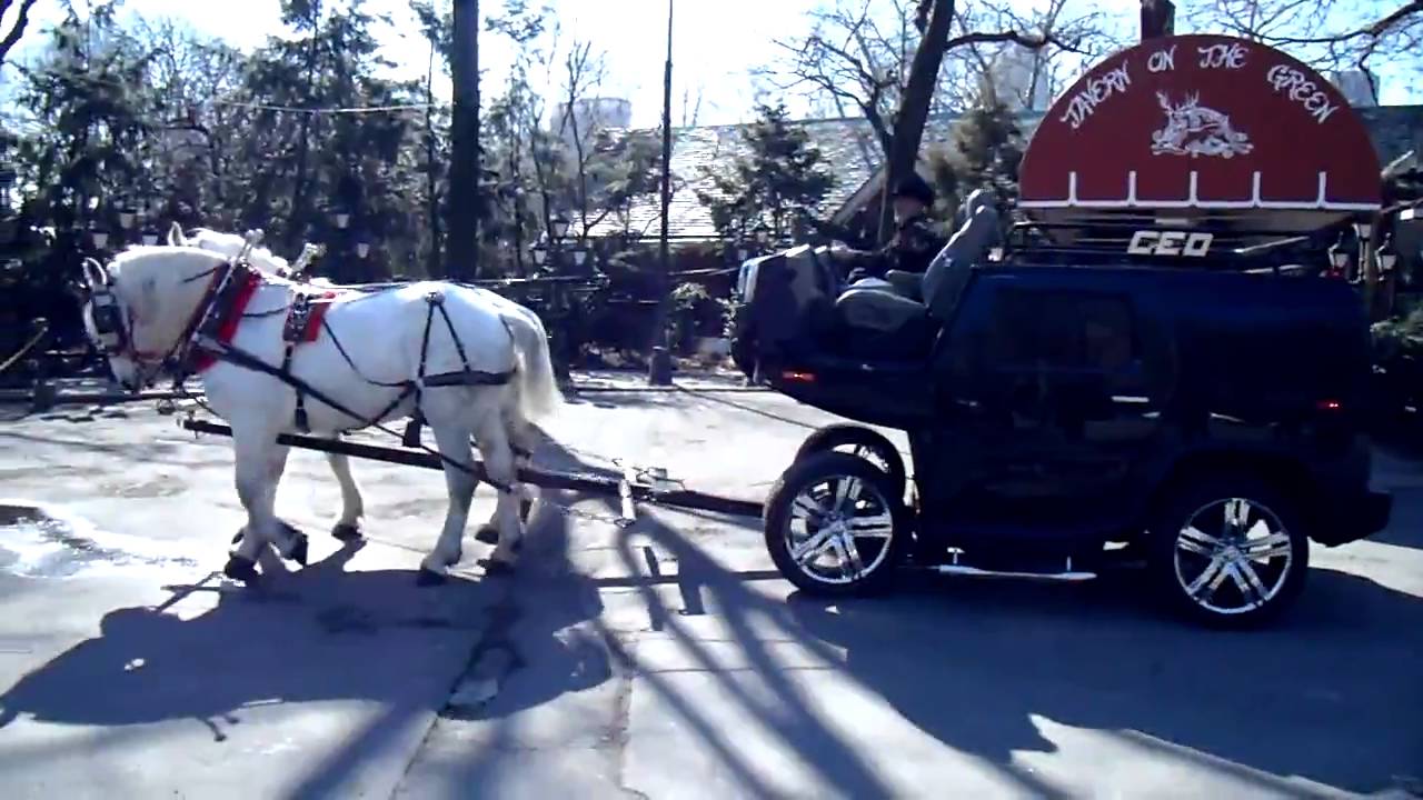 horses with de-pimped hummer H2 carriage in Central Park by artist ...