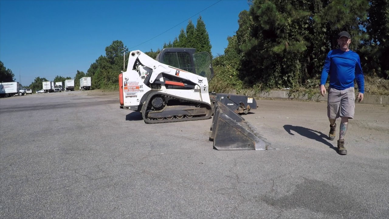 Bobcat street sweeper, broom attachment on asphalt. - YouTube