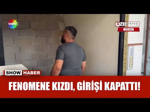 Apartmanın girişine duvar ördü!
