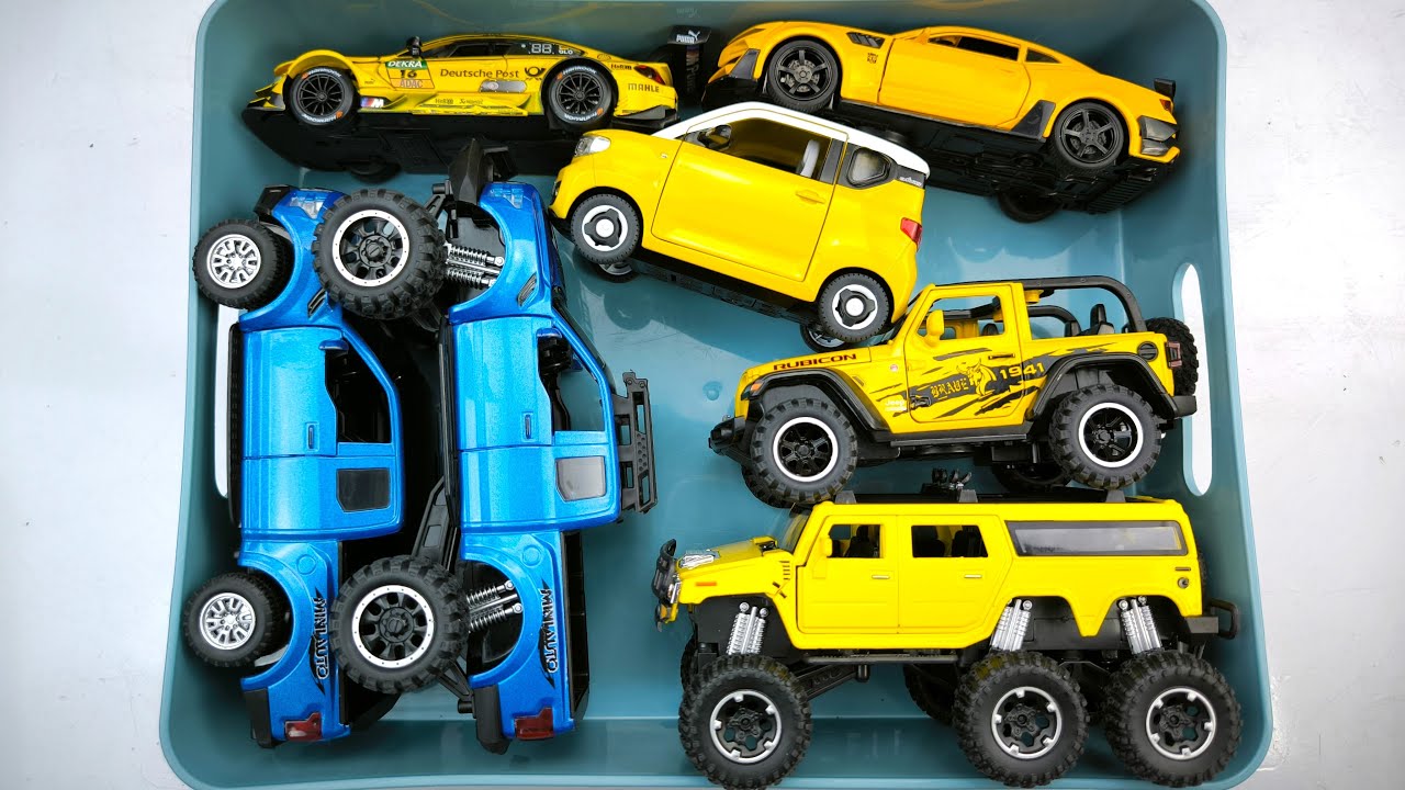 Box full of various miniature cars Peugeot, Volvo, Renault, Hyundai ...