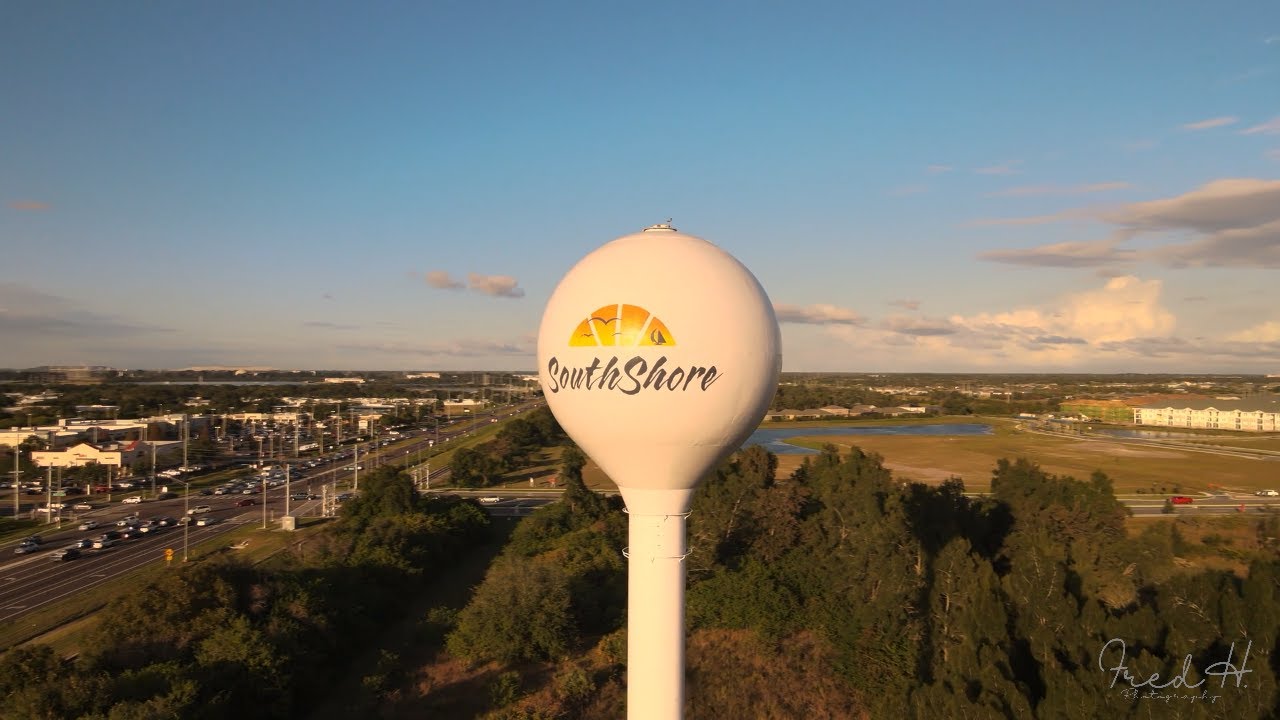 Aerial spotlight of the South Shore water tower in Apollo Beach Florida ...