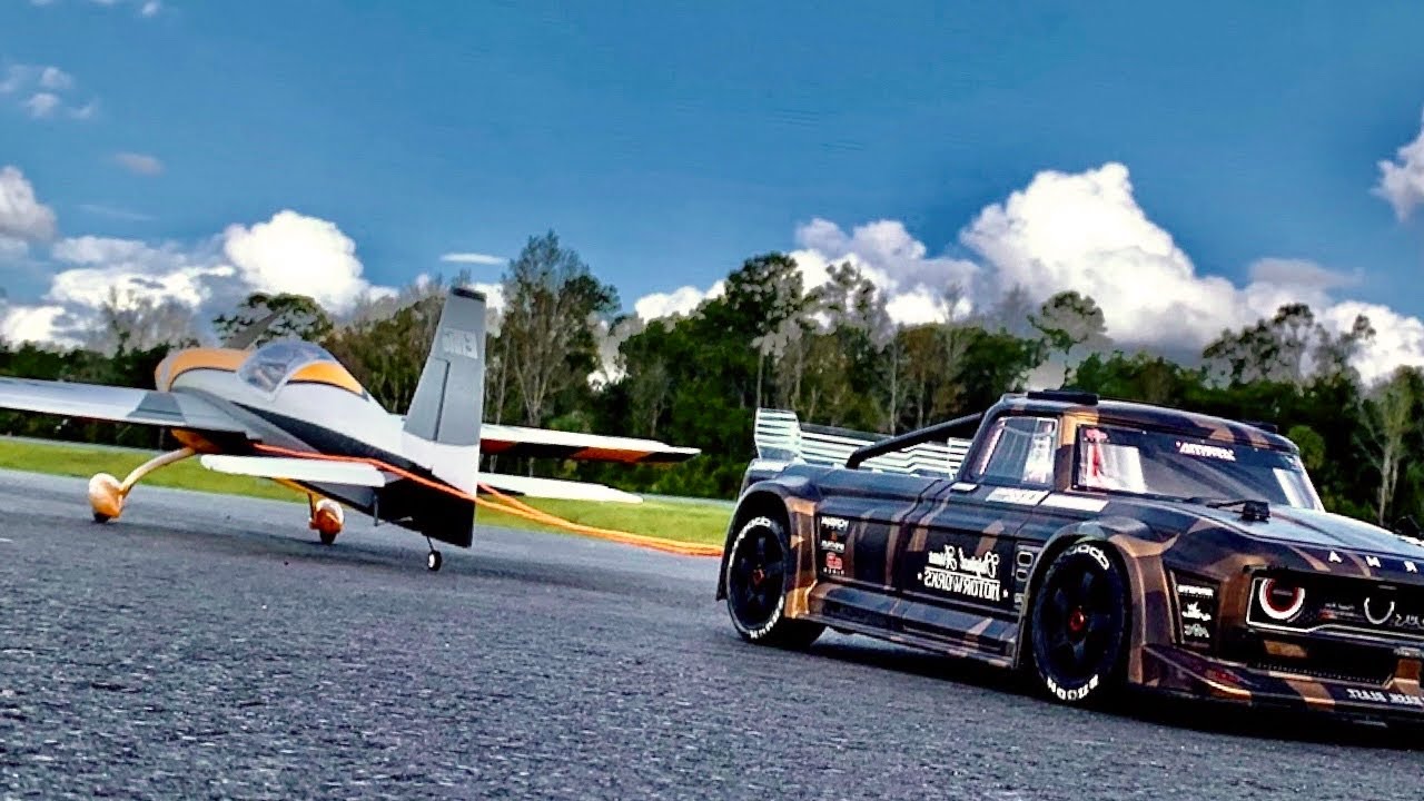 CAR PULLING PLANE - YouTube