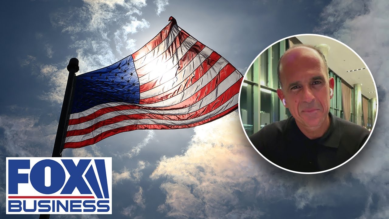 Camping World CEO fights to fly massive American flag - YouTube