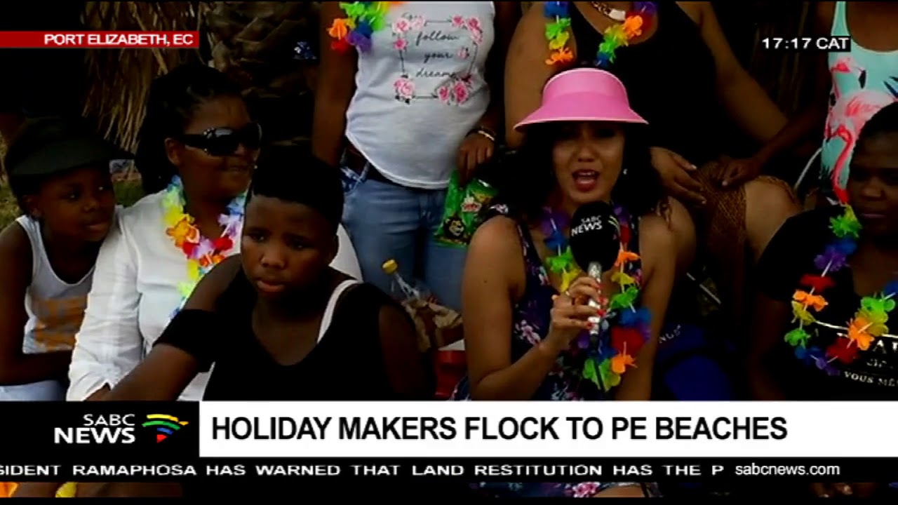 Thousands flock to Port Elizabeth beaches - YouTube