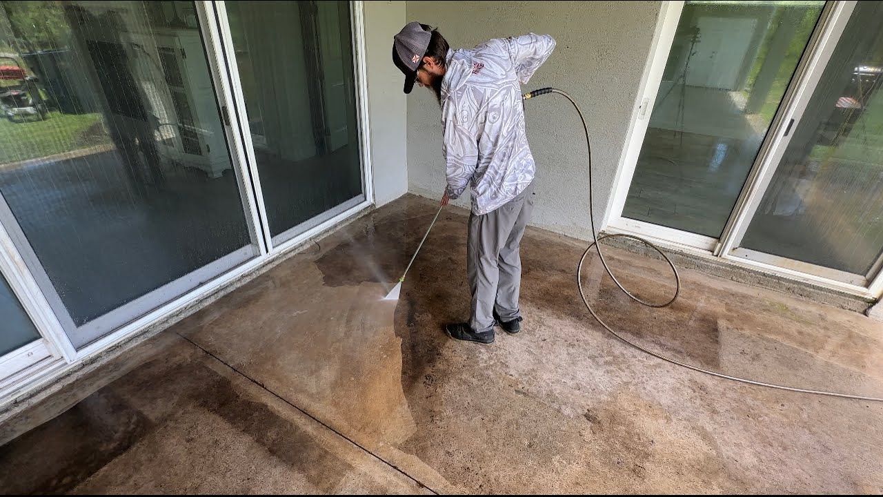 This FILTHY back PATIO looks brand NEW after I pressure washed it ...